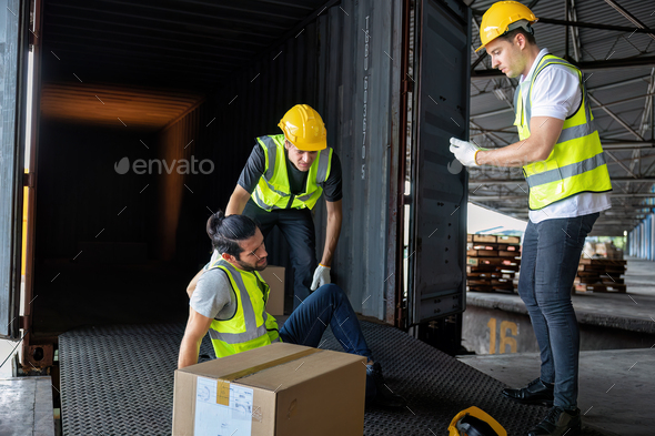 Worker carry carton box taken from 40 feet steel container got accident ...