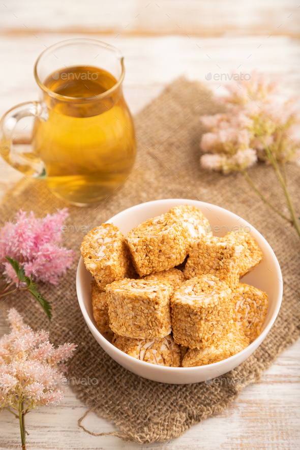 Traditional turkish delight (rahat lokum) in white ceramic plate with ...