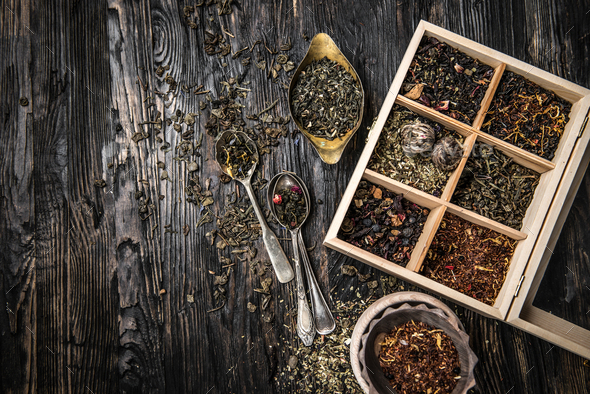 variety of teas, mixes in copper dish, topview Stock Photo by tan4ikk
