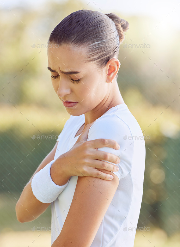 Sport, exercise and pain with a sports woman holding her injured or ...