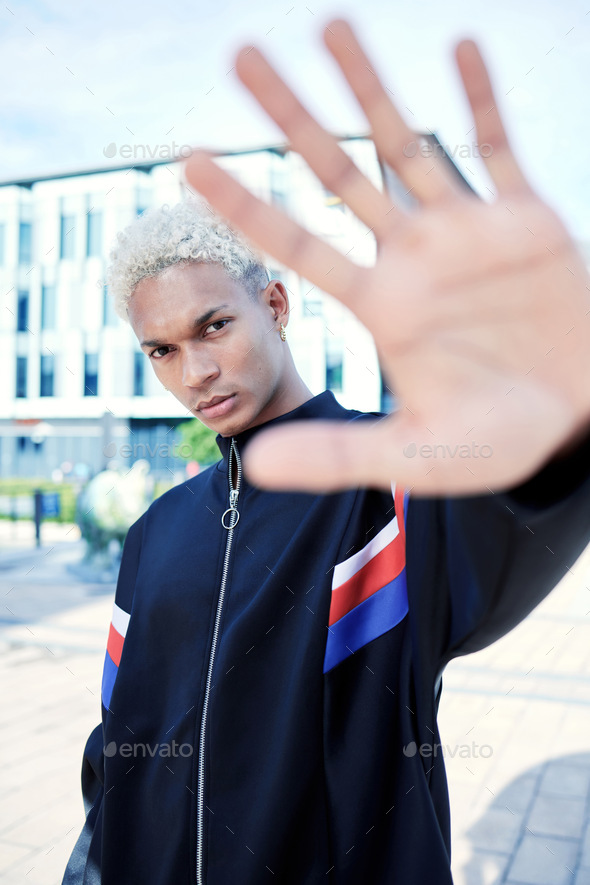 Portrait of black man, hand and urban fashion, street and modern style ...