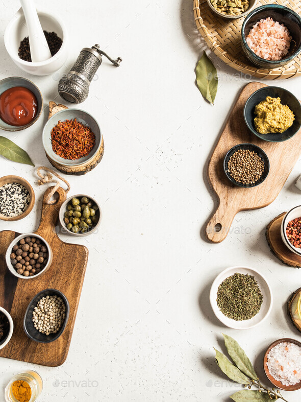 Borders of various dry spices and sauces on a light background Stock ...
