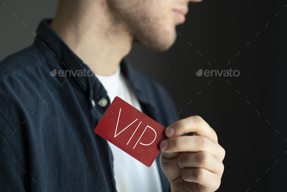 a person showing VIP card pass, exclusive access membership Stock Photo ...