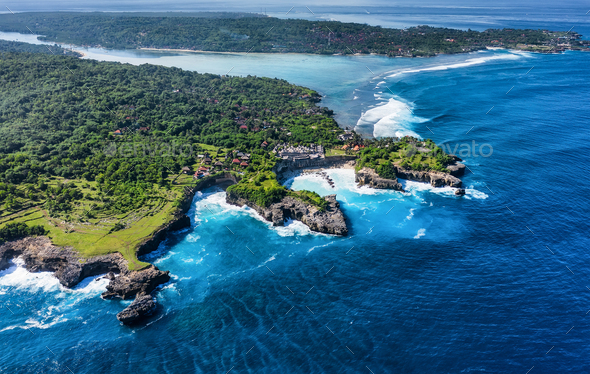 Travel and vacation image. Aerial view at sea and rocks. Blue water ...