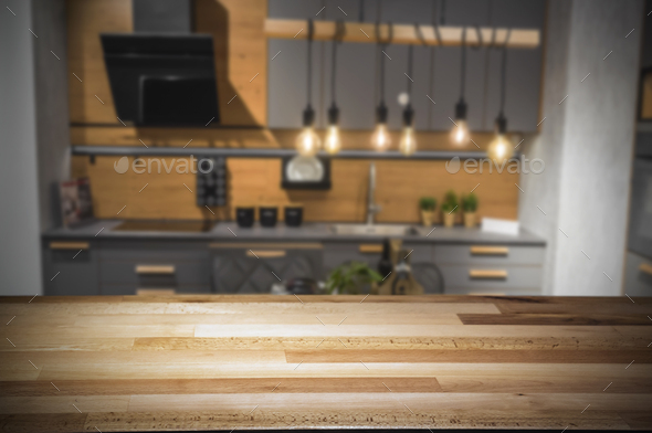 Wooden table and modern kitchen backround ready for product or food ...