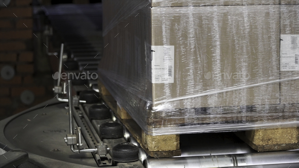 Conveyer roller sorting system in distribution warehouse. Clip. Modern ...