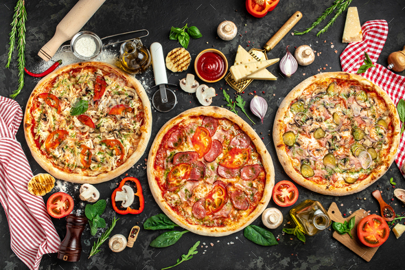 pizza set on a dark background, Fast food lunch, vertical image. top ...