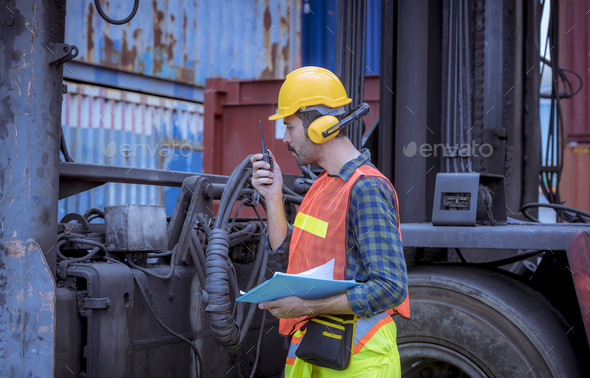 Dock worker under inspection and checking about dock container shipping ...
