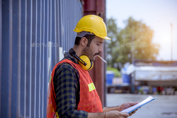 Dock worker under inspection and checking about dock container shipping ...