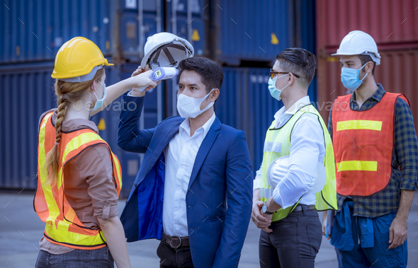 The worker used a medical Digital temperature Thermometer to check ...