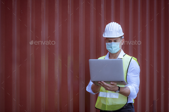 Portrait engineer dock worker under working and checking production ...