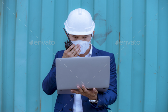 Manager and dock worker under discussion about dock container shipping ...
