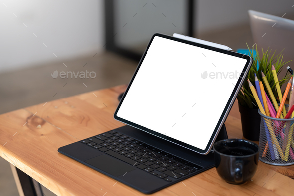 Blank tablet screen Placed on the table at the office. Mock up. Stock ...