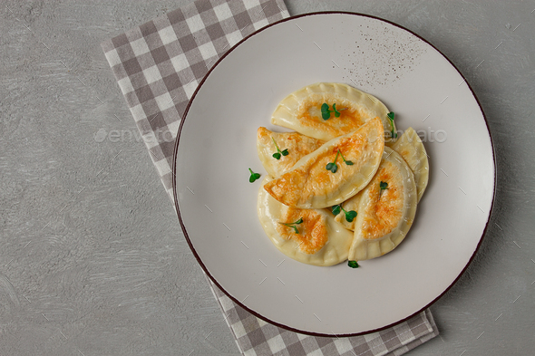 Pierogi, a traditional dish of Polish cuisine, dumplings, top view ...