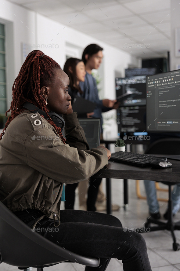 Pensive african american app developer programming code development ...