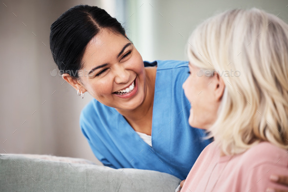 How are you feeling today. Shot of a female nurse smiling while talking ...