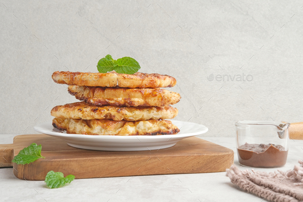 Stack of Caramelized Croissant Waffle or Croffle Caramel Stock Photo by ...