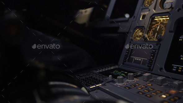 Panel of switches on an aircraft flight deck. Autopilot control element ...