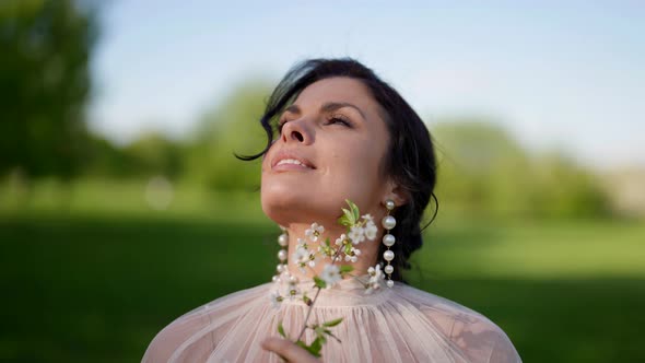 Portrait of Beautiful Woman in Spring Day in Nature Lady is Holding ...