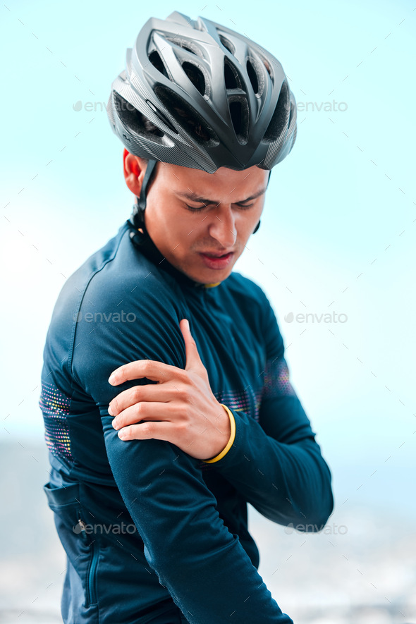 Sport, injury and arm pain with man cyclist during exercise routine ...