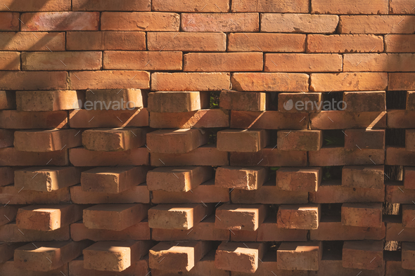 The old brick wall background are arranged in alternating pattern to ...