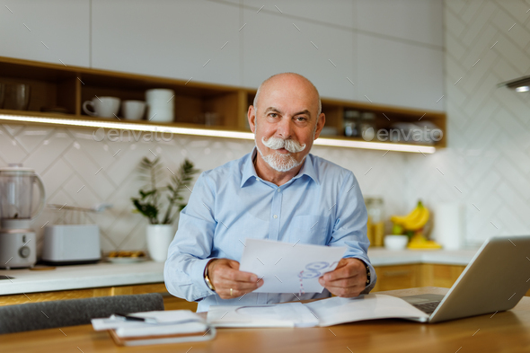 Doing calculation, paper work. Stock Photo by bnenin | PhotoDune
