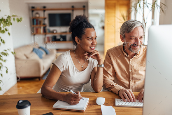 Adult business people, working together at home office. Stock Photo by ...