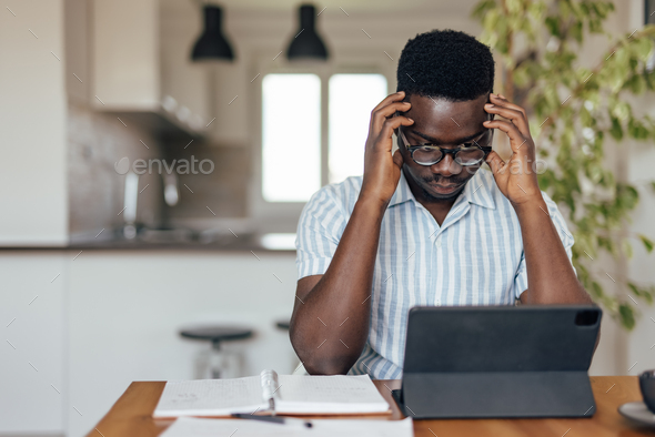 Adult black man, helping his company with its problems. Stock Photo by ...