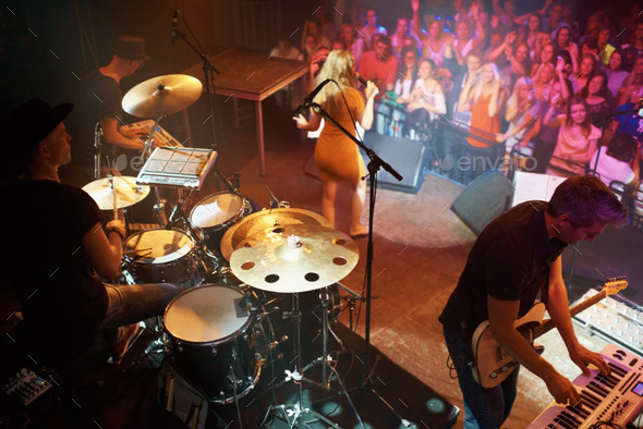 See it from the bands perspective. Rear view of a band performing on ...
