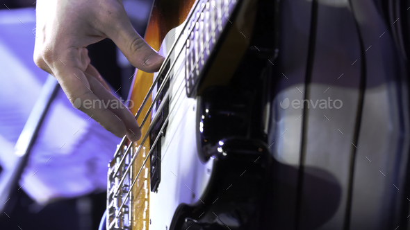 Guitar playing. Guitarist. Man hand and six-string electrical guitar ...