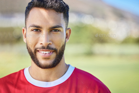 Soccer player, portrait and man on soccer field happy, smile and ...