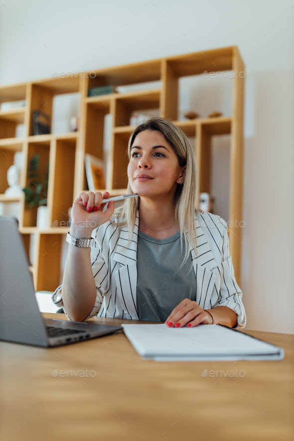 Write an email to someone. Stock Photo by bnenin | PhotoDune