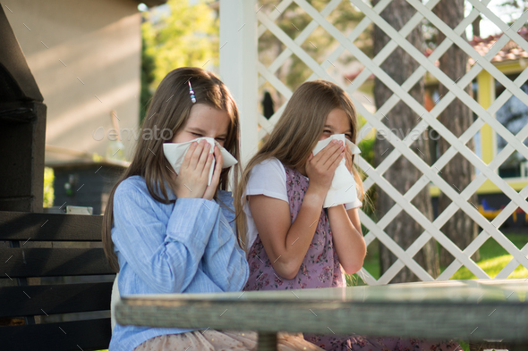 Little girls Sneezing Stock Photo by StockRocketStudio | PhotoDune