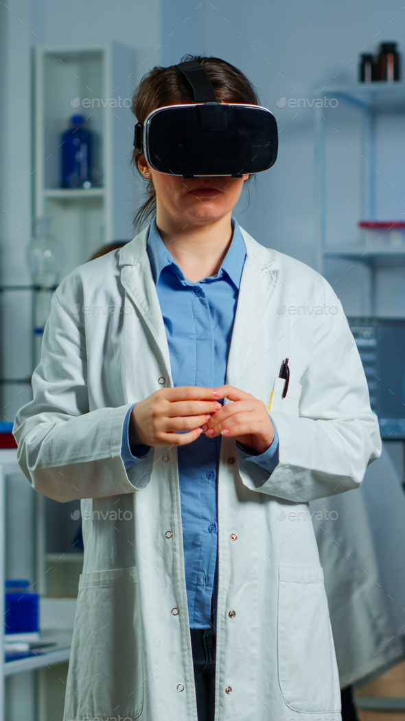 Laboratory doctor experiencing virtual reality in neurological lab ...