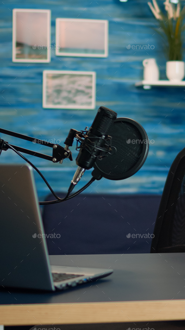 Empty podcast room with professional microphone Stock Photo by DC_Studio