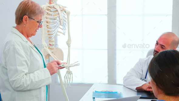 Radiologist doctor holding presentation using human skeleton Stock ...