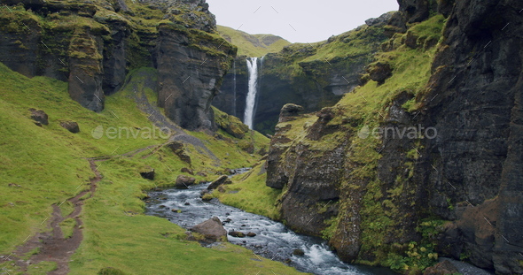 Iceland spectacular Kvernufoss waterfall Summer scene of mountain river ...