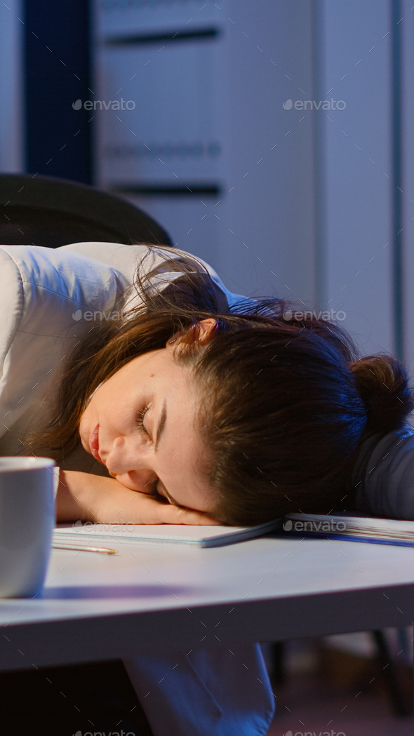 Exhausted overload business woman falling asleep on desk Stock Photo by ...