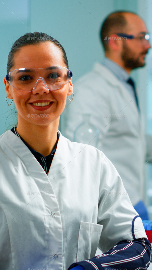 Laboratory doctor looking at camera smiling Stock Photo by DC_Studio