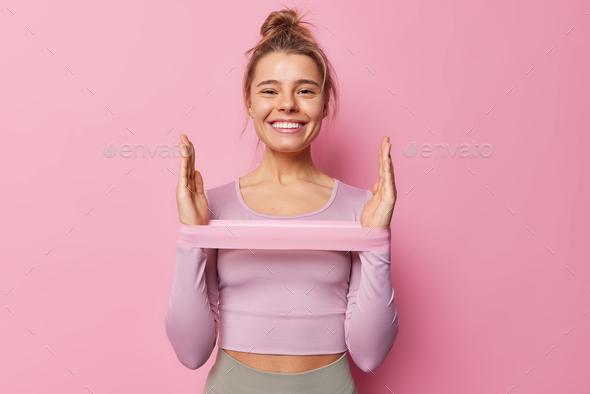 Strength and motivation concept. Positive young European woman with ...