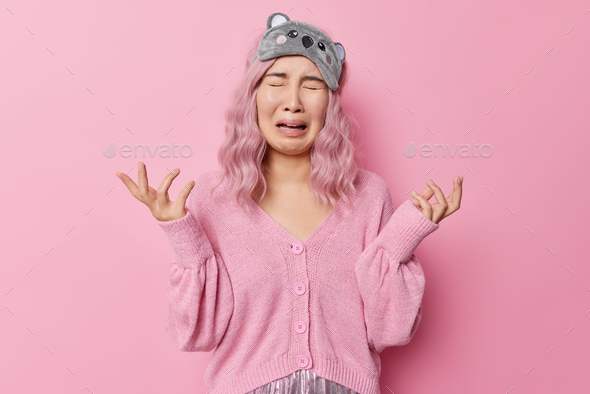 Upset frustrated doleful woman raises hands feels disappointed cries ...