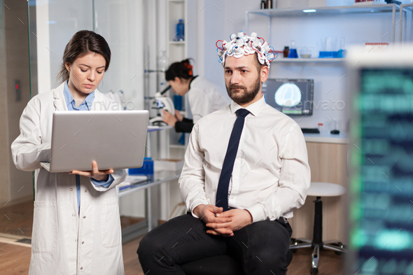 Medic in neuroscience working in neurological research Stock Photo by ...