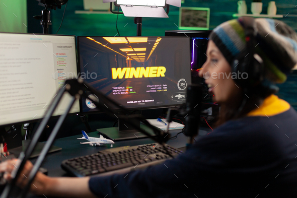 Streamer woman winning virtual videogame competition Stock Photo by DC ...