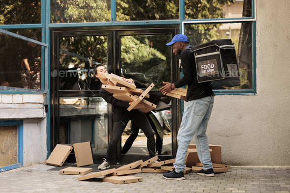 Shocked food delivery customer catching falling pizza boxes pile Stock ...