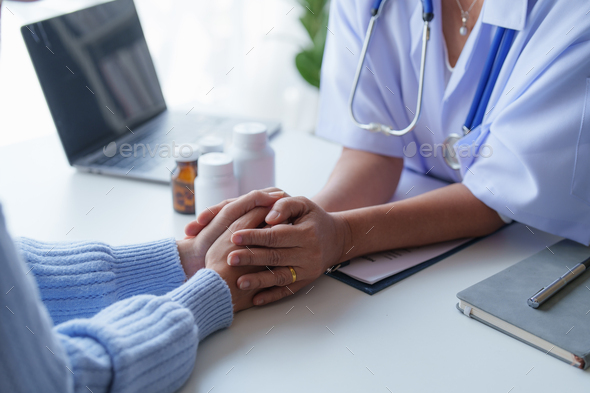 Doctor having conversation with patient while discussing explaining ...