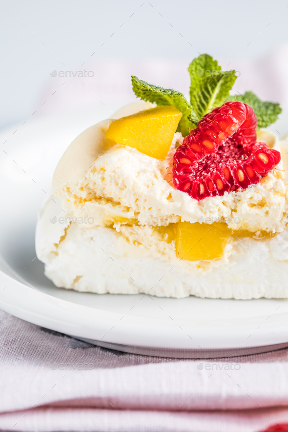 Homemade delicious meringue cake Pavlova with whipped cream, fresh ...