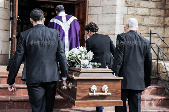 Death, funeral and holding coffin in church for grief, bereavement and ...