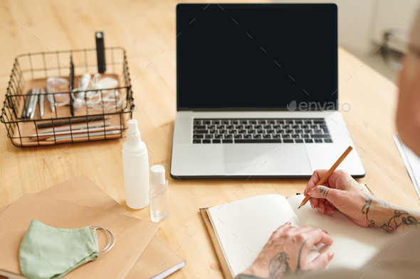 Making task list for work day Stock Photo by Media_photos | PhotoDune