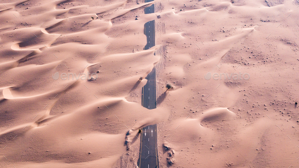 Highway covered by sand after a sandstorm in a desert in UAE Stock ...