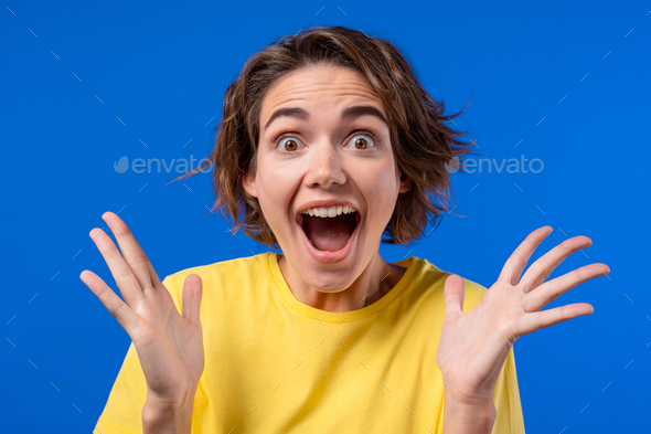 Amazed woman glad, she screaming WOW. Impressed lady trying to get ...